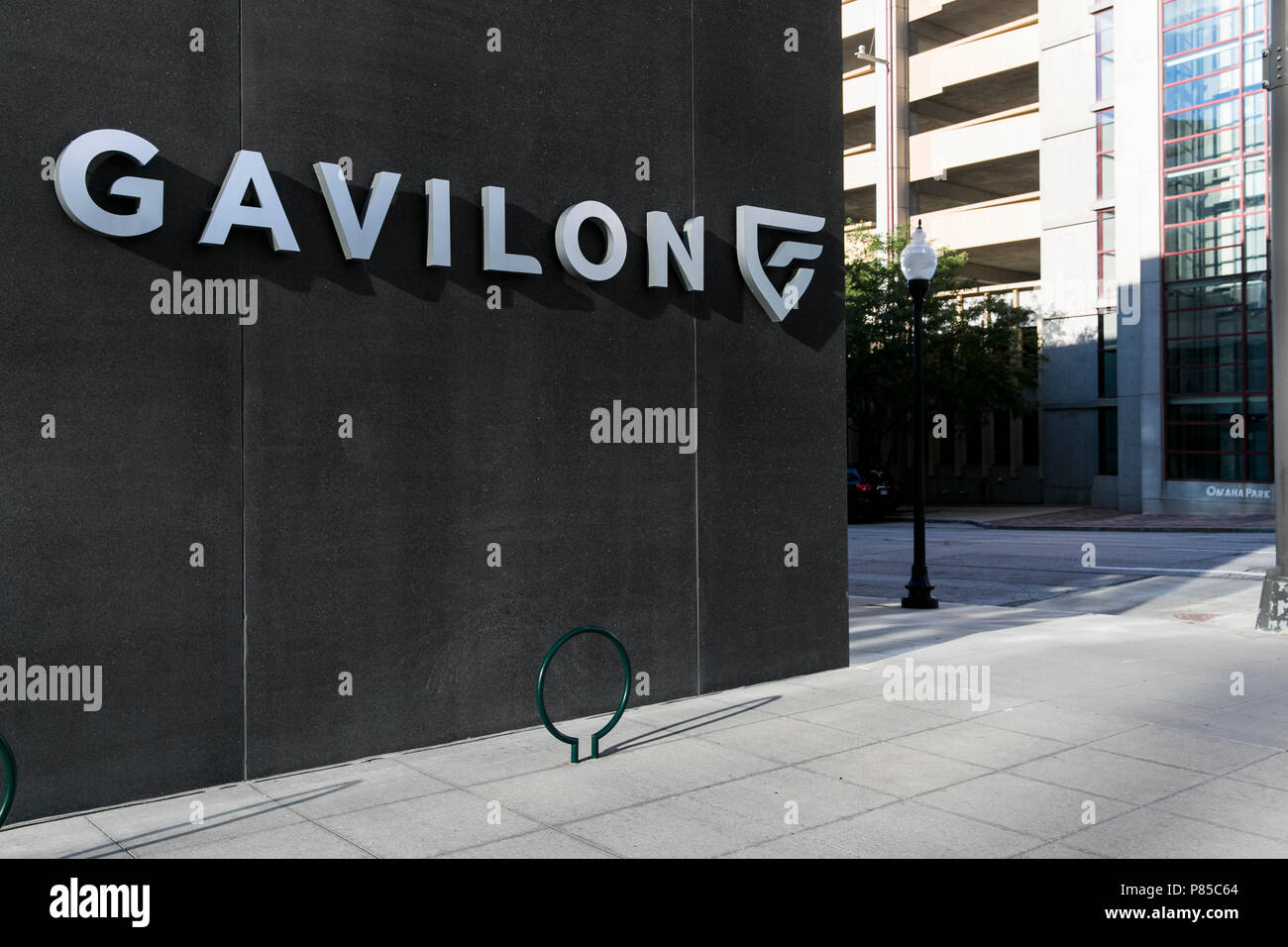 A logo sign outside of the headquarters of Gavilon in Omaha, Nebraska ...