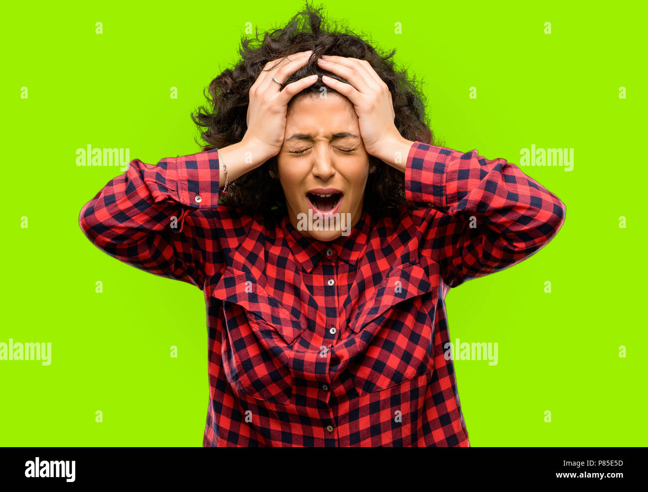 Beautiful arab woman stressful keeping hands on head, terrified in ...