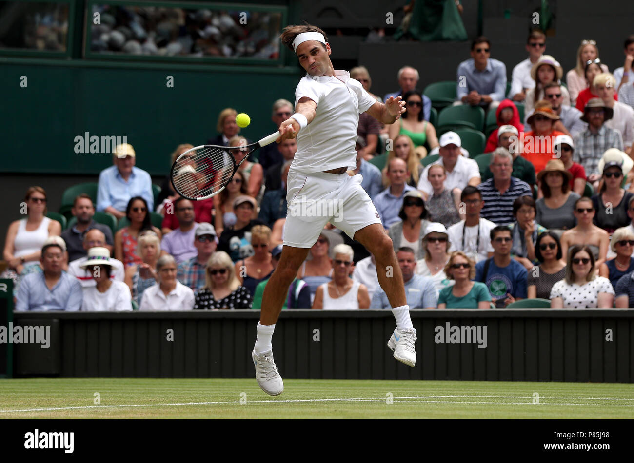 Roger Federer in action on day seven of the Wimbledon Championships at ...