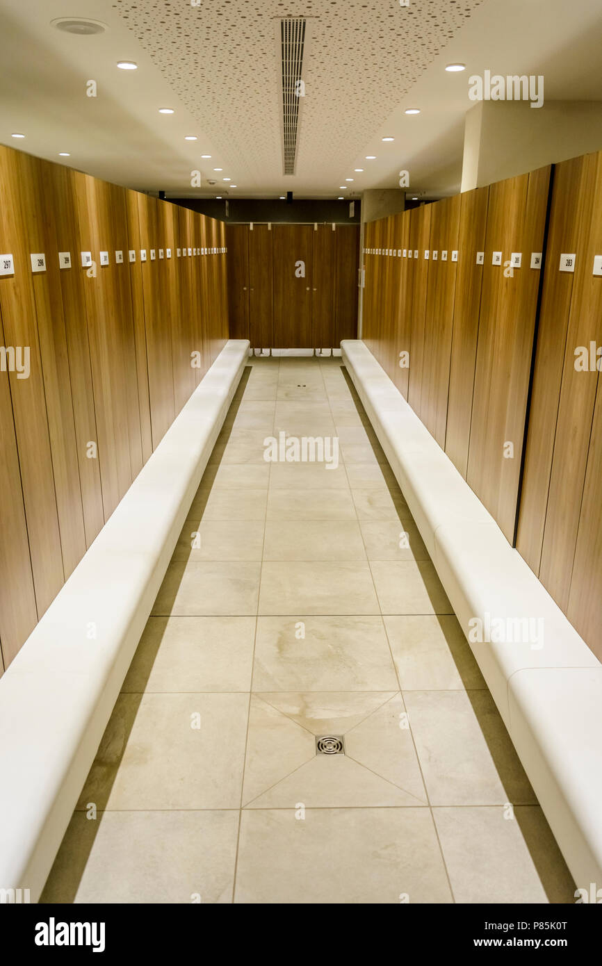 Modern Storage lockers in a swimming pool with bench , and led lighting ...