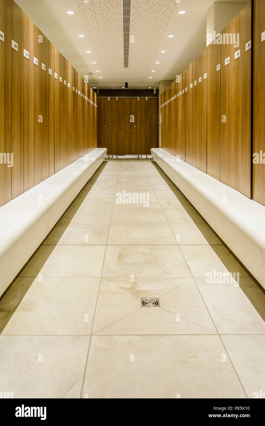 Modern Storage lockers in a swimming pool with bench , and led lighting ...