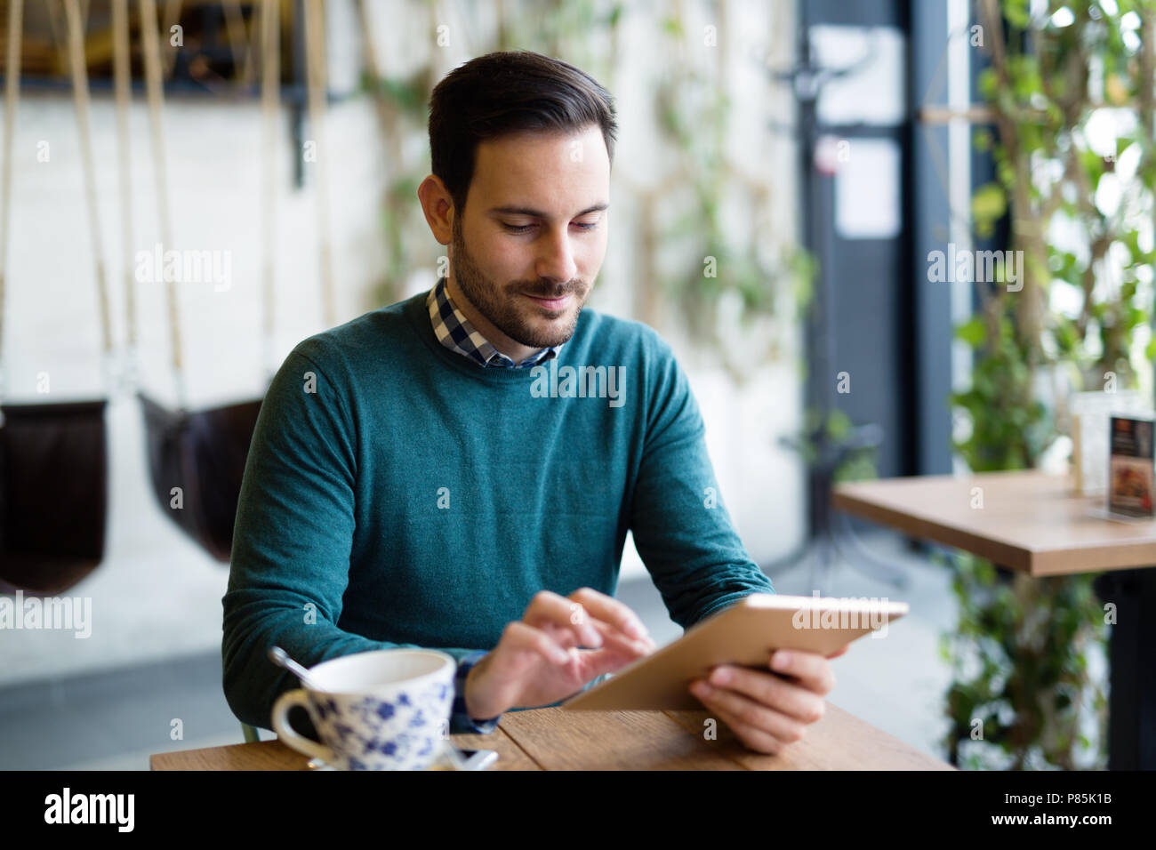 Young businessman using device work hi-res stock photography and images ...