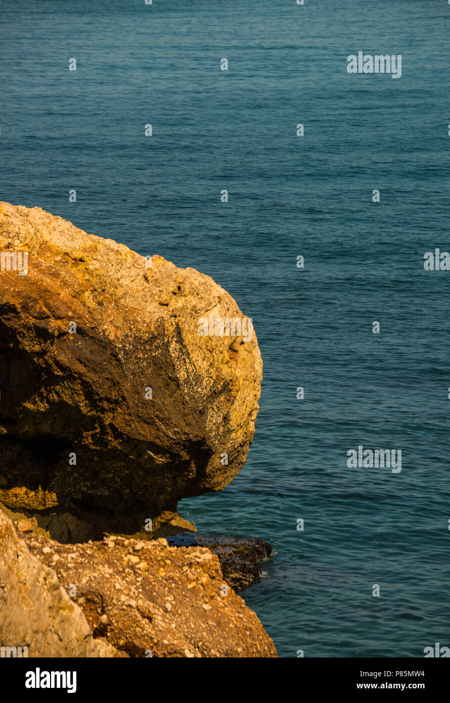 high cliff above the sea, summer sea background, many splashing waves ...