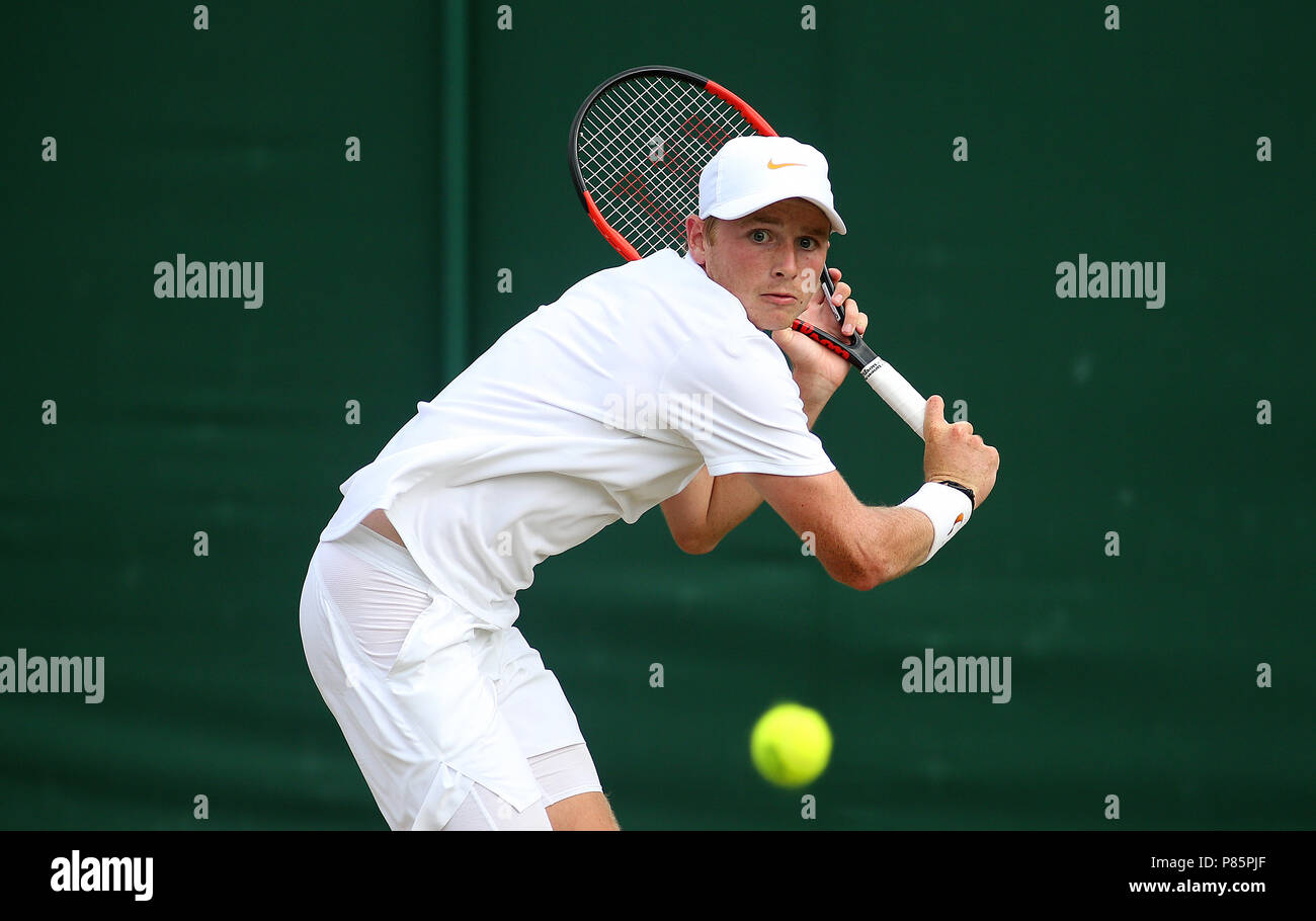 Aidan Mchugh in action on day seven of the Wimbledon Championships at the All England Lawn ...