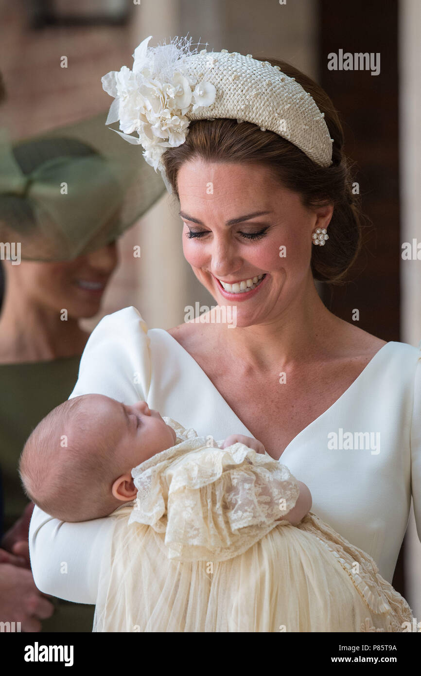 The Duchess of Cambridge carries Prince Louis as they arrive for his ...