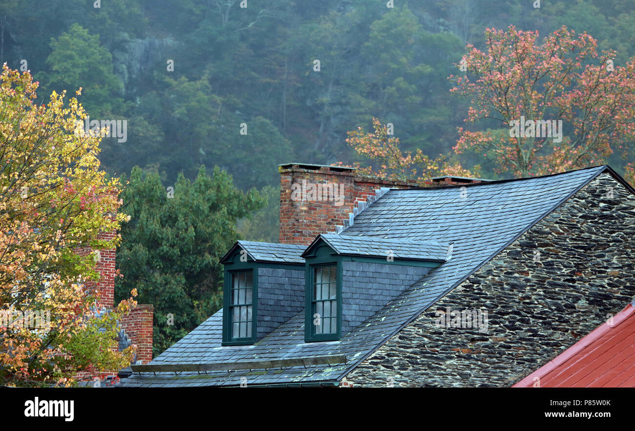 roof top view of historic buildings made of stone and brick with slate ...