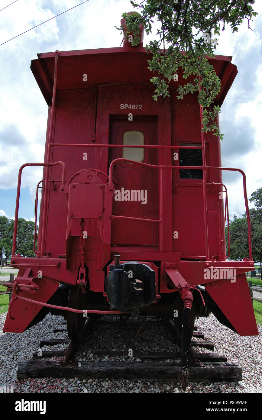 Red caboose train on railroad tracks Stock Photo - Alamy