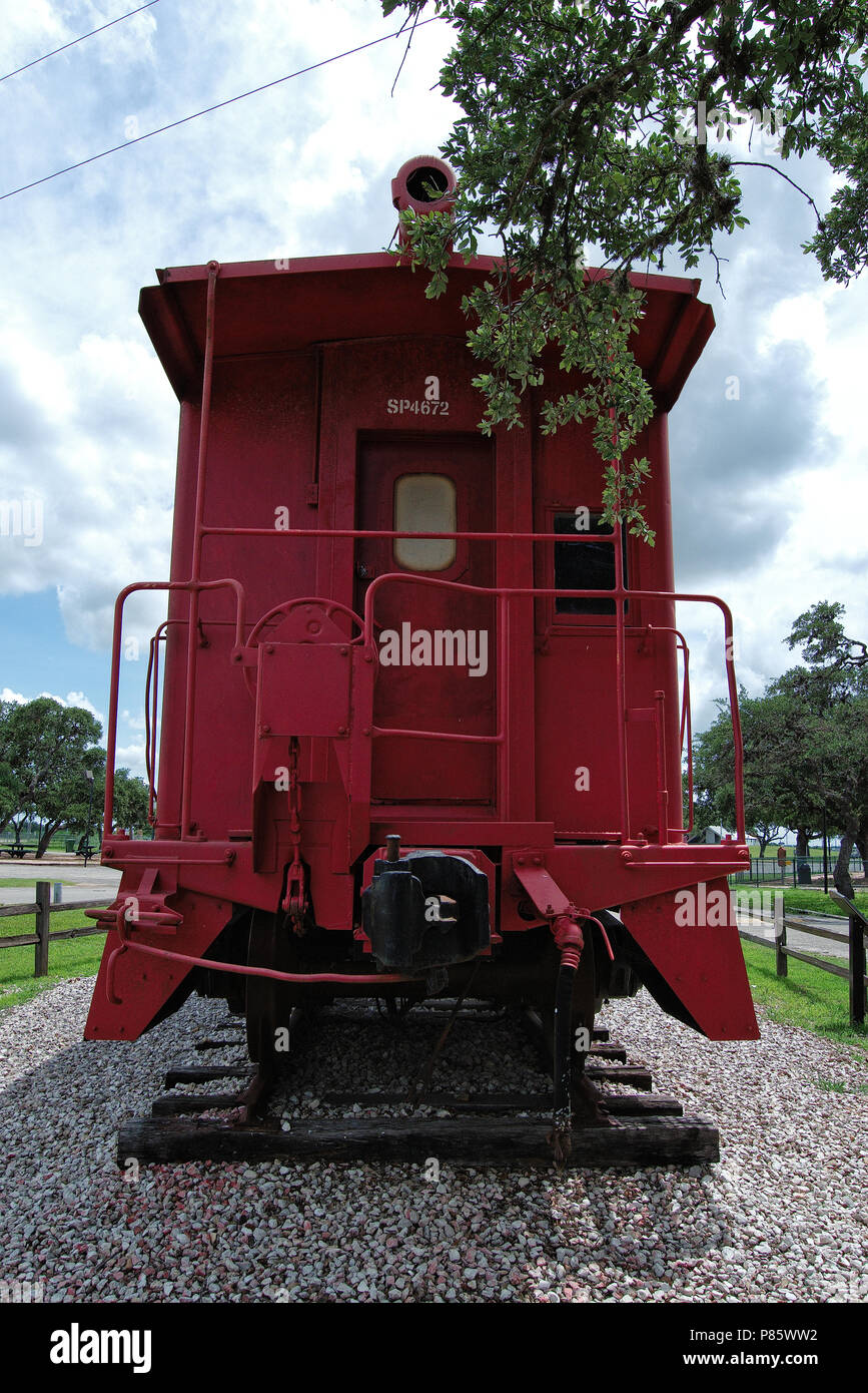 Red caboose train on railroad tracks Stock Photo - Alamy