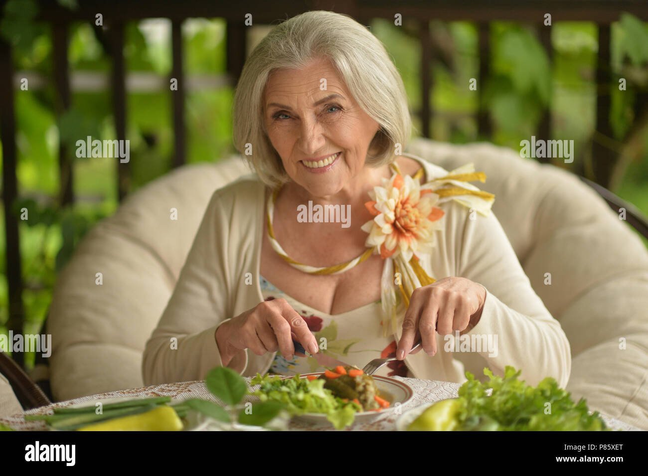 Old Woman Eating Salad
