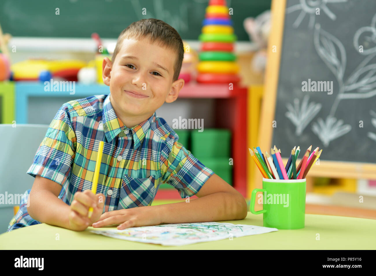 little boy drawing with pencil Stock Photo - Alamy