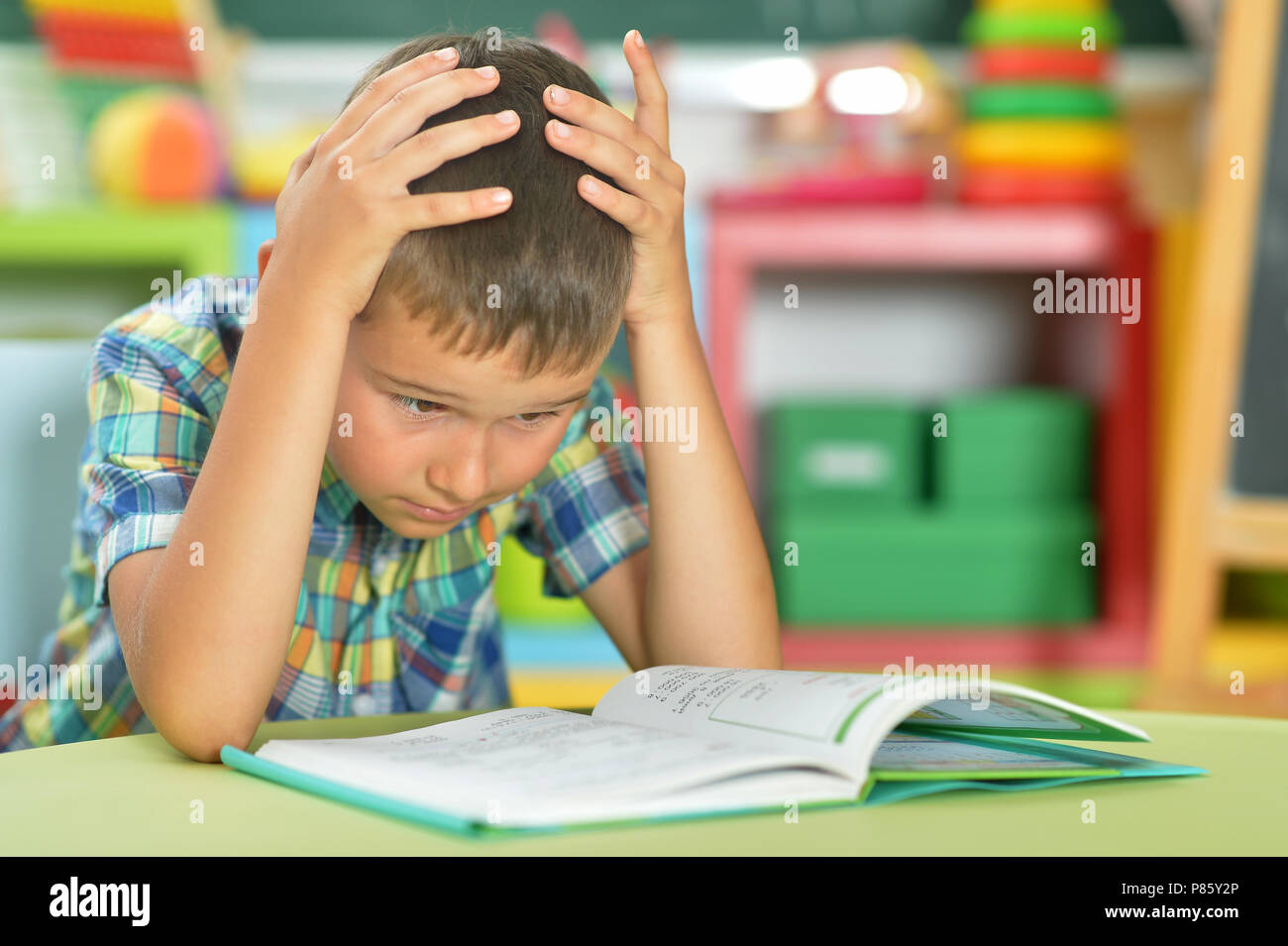 boy reading book Stock Photo - Alamy
