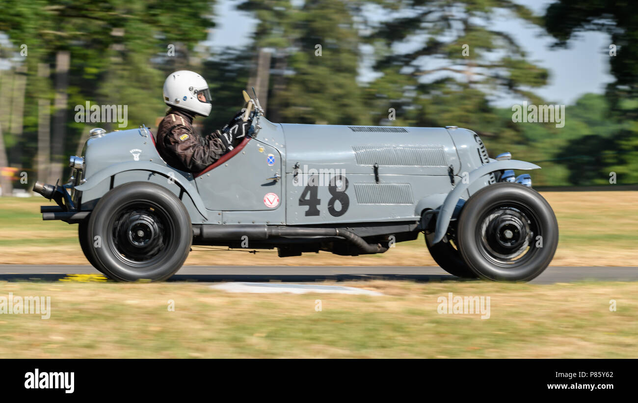 Classic car racing Stock Photo - Alamy