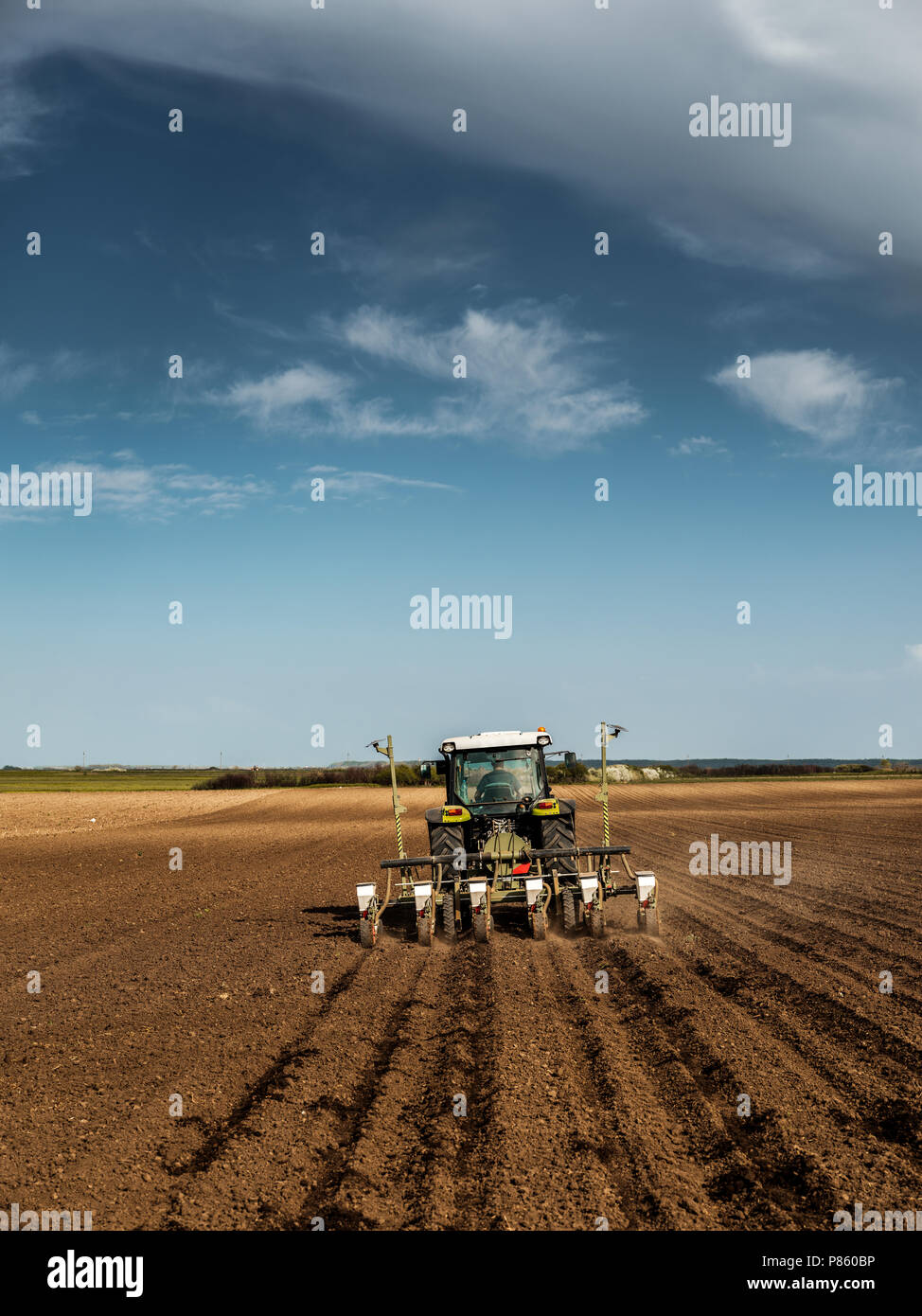 Farmer seeding, sowing crops at field. Sowing is the process of ...