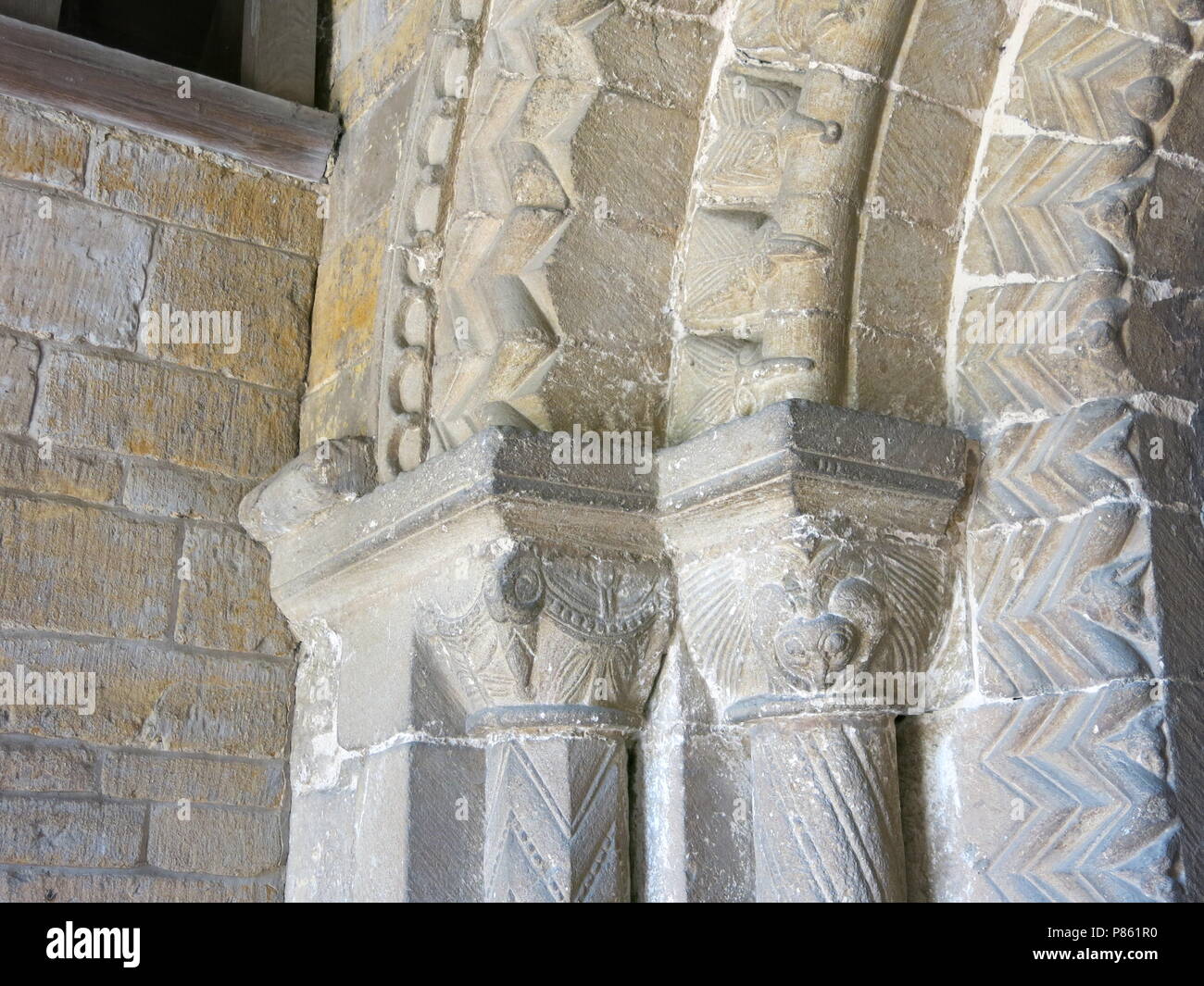 The south door, built by the Normans around 1180, has a typical chevron ...