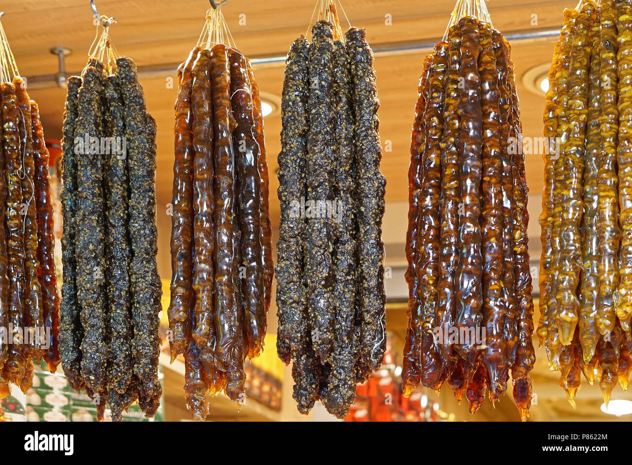 Traditional Turkish sweets hanging at market Stock Photo - Alamy