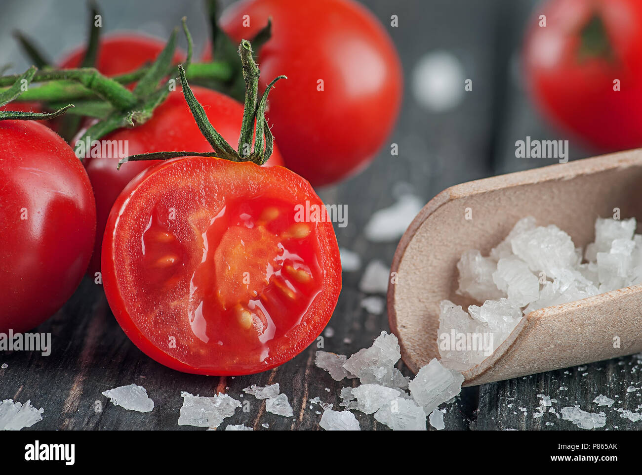 Cherry tomatoes and salt Stock Photo - Alamy