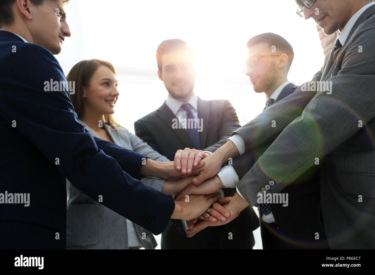 business people teamwork stacking hand together concept Stock Photo - Alamy