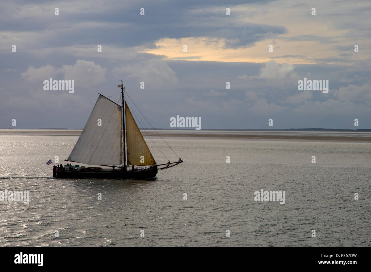 Zeilboot op de Waddenzee; Sail ship on the Waddensea Stock Photo - Alamy