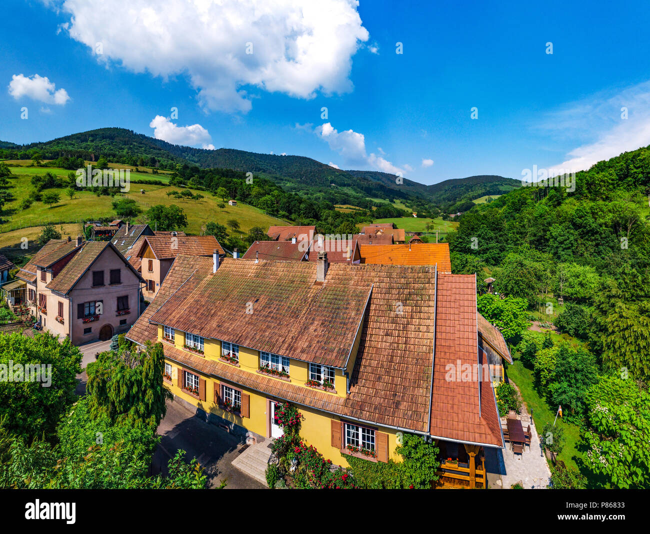 Old but renovated village house in countryside aerial view, Alsace ...
