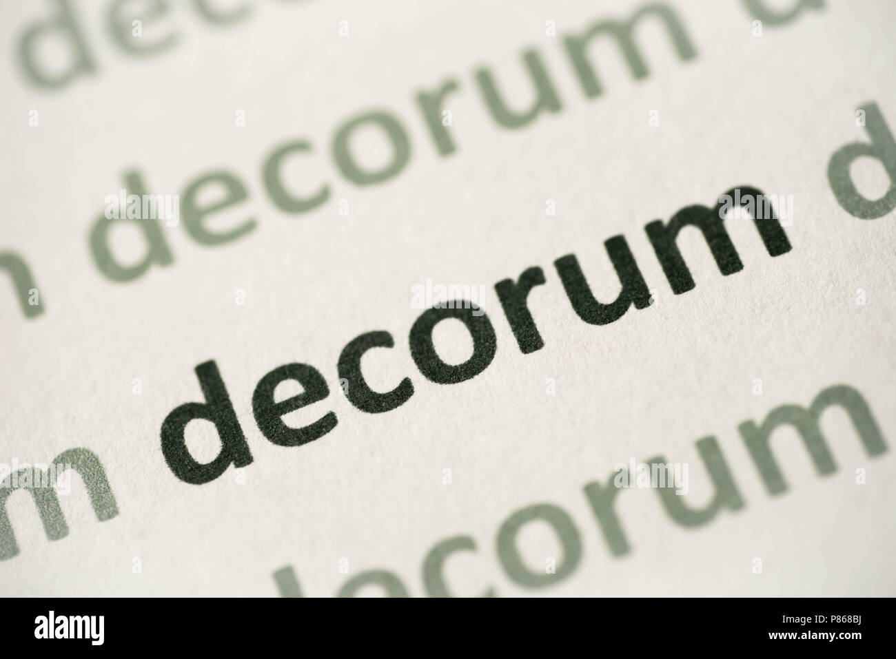 word decorum printed on white paper macro Stock Photo - Alamy