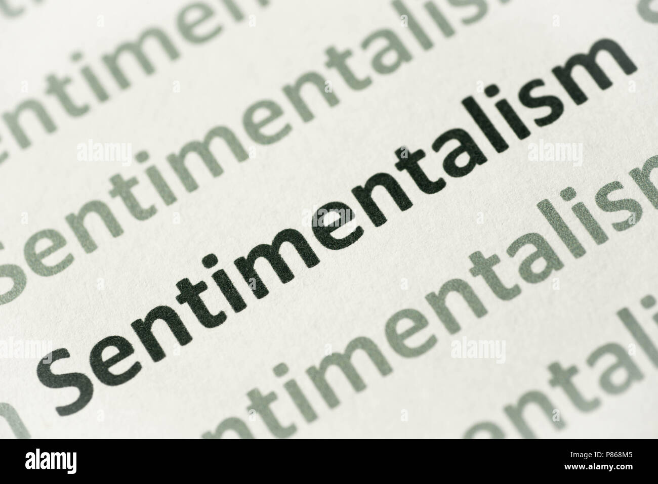 word Sentimentalism printed on white paper macro Stock Photo - Alamy
