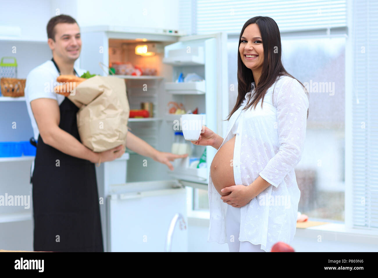 Pregnant pregnancy fridge hi-res stock photography and images - Alamy