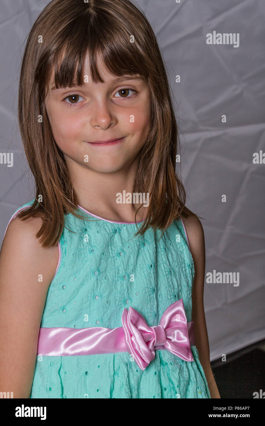 Dark Haired Pretty Pre Teen Caucasian Girl Posing For Camera Charlie