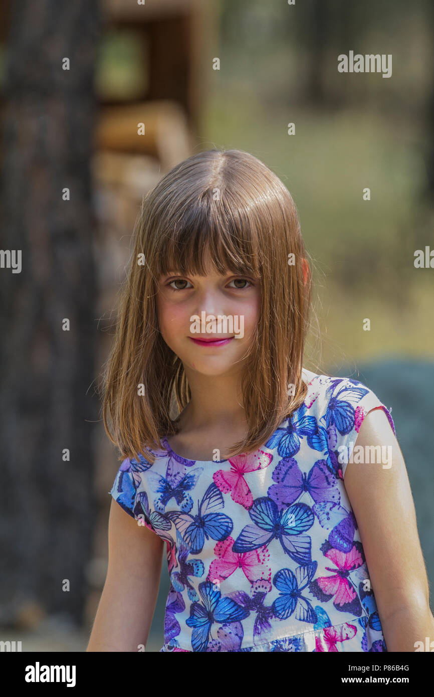 Dark haired, pretty pre-teen caucasian girl, posing for camera. Charlie ...