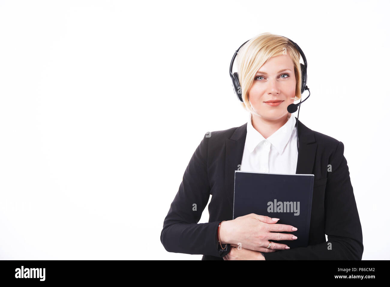 Call center operator, blonde woman dressed in black jacket holding ...