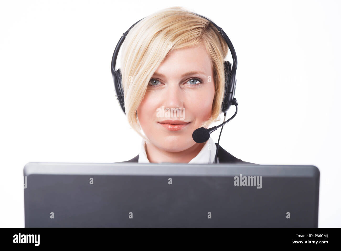 Call center operator, blonde woman dressed in black jacket working with ...