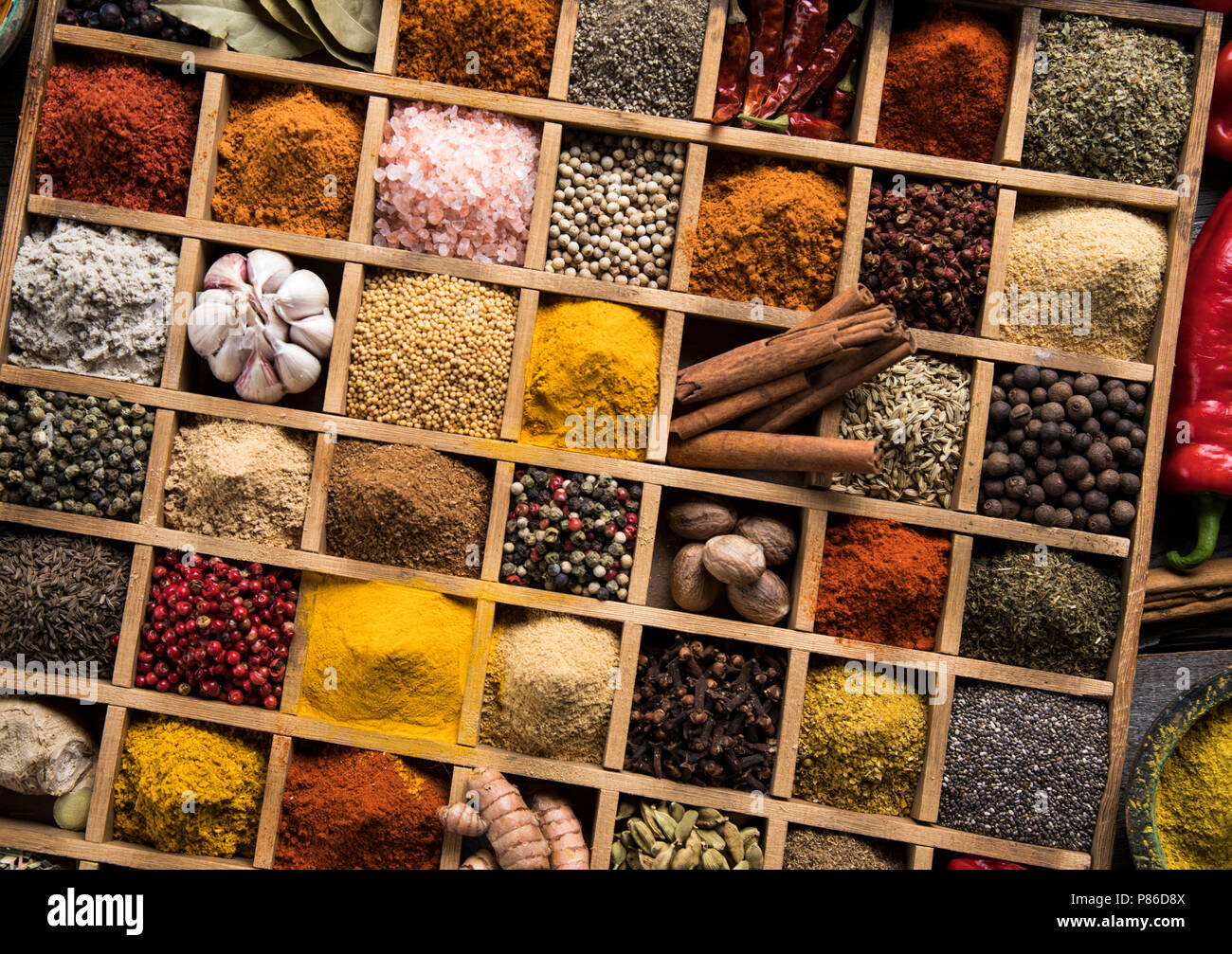 Wooden box with spices and herbs Stock Photo - Alamy