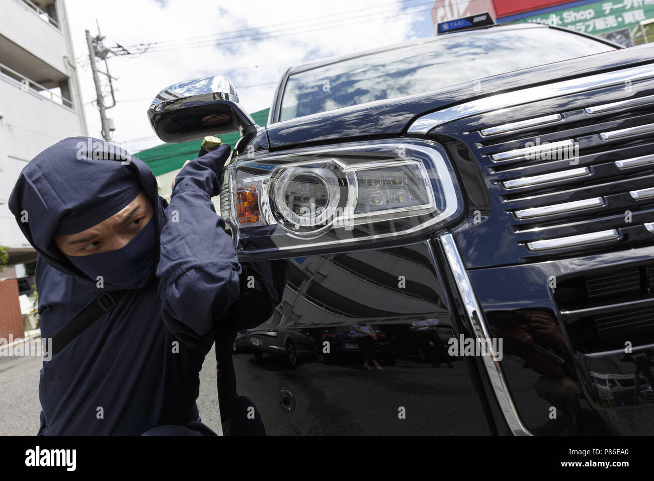 July 9, 2018 - Yokohama, Japan - A taxi driver dressed in Ninja costume ...