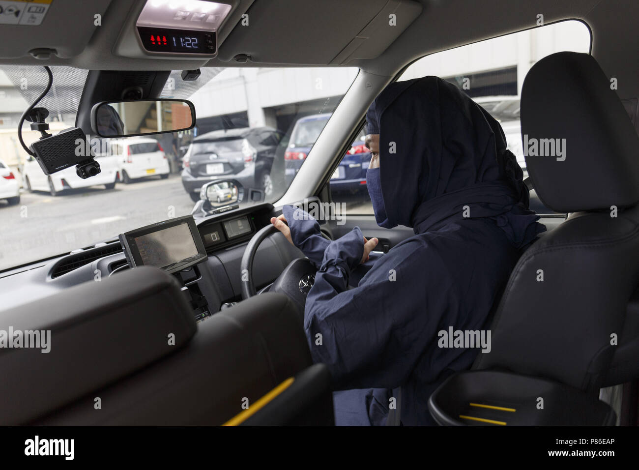 July 9, 2018 - Yokohama, Japan - A Sanwa Koutsu Group taxi driver ...