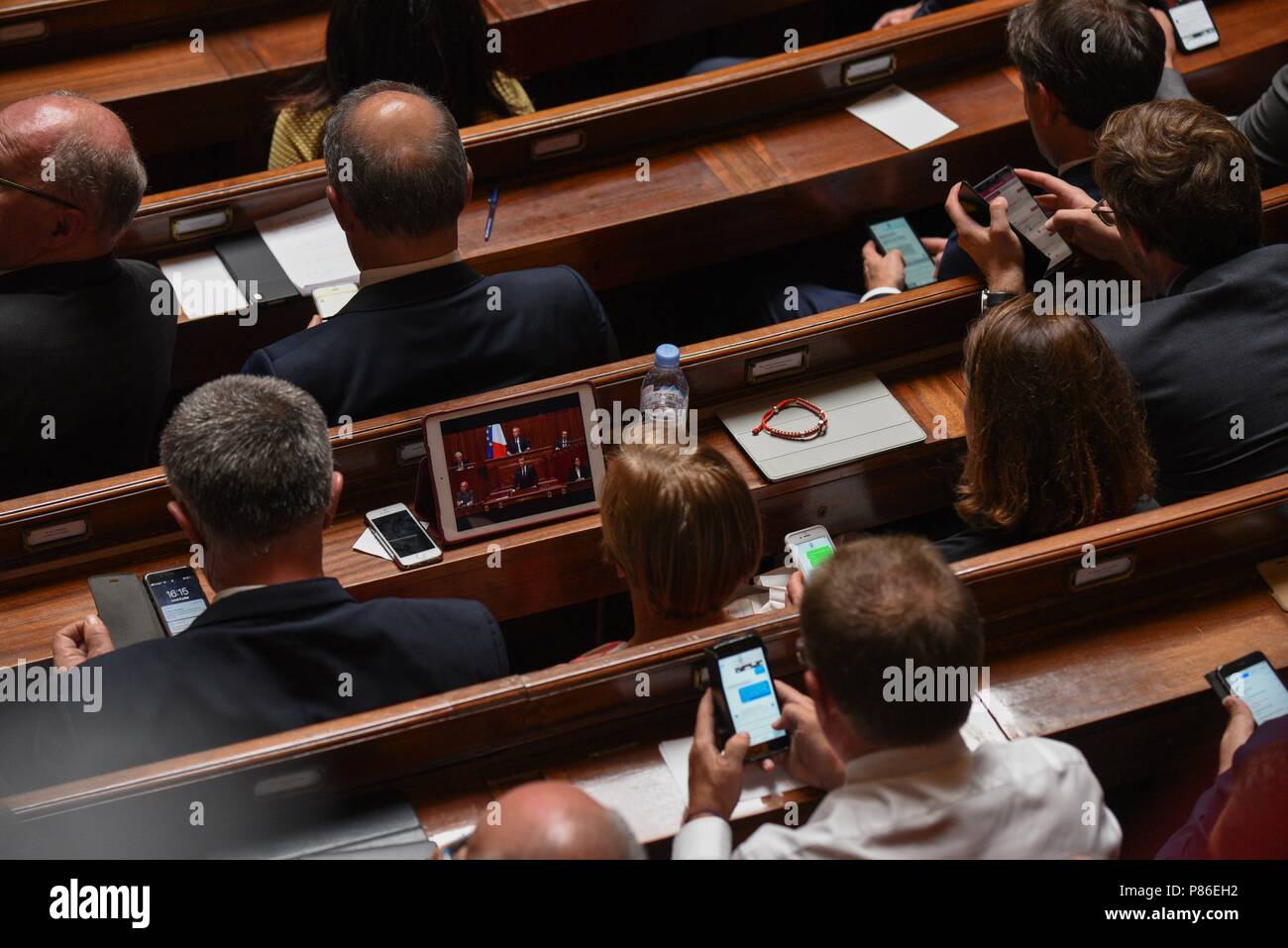 Versailles, France. 9th July, 2018. French parliamentarian look at ...