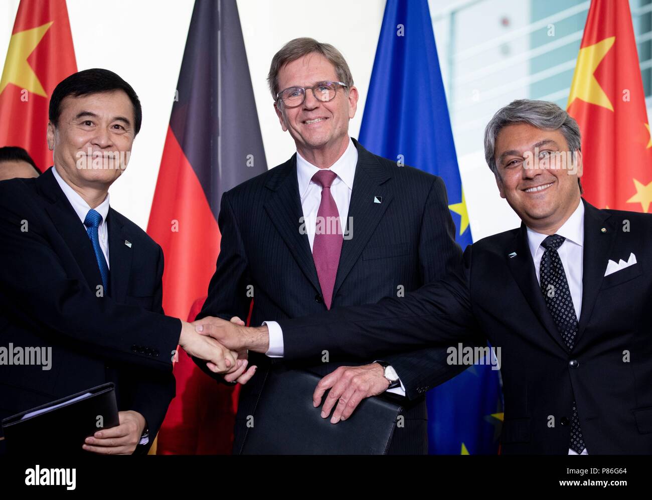 Berlin, Germany. 09th July, 2018. An Jin, Jochen Heizmann and Luca de ...