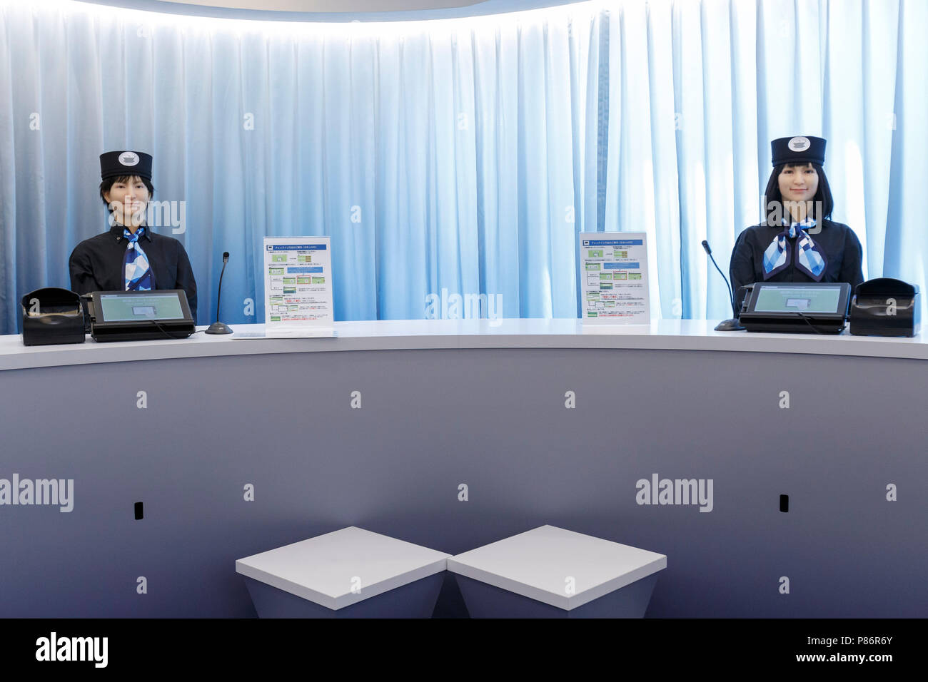 Tokyo, Japan. 10th July 2018. Humanoid robots work at the front desk of ...