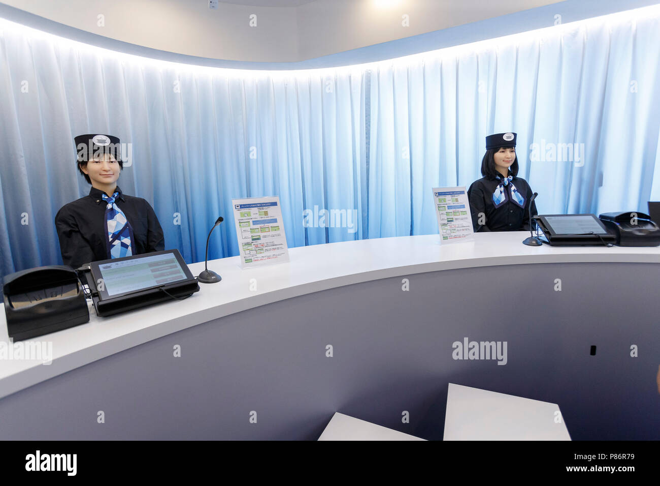 Tokyo, Japan. 10th July 2018. Humanoid robots work at the front desk of ...
