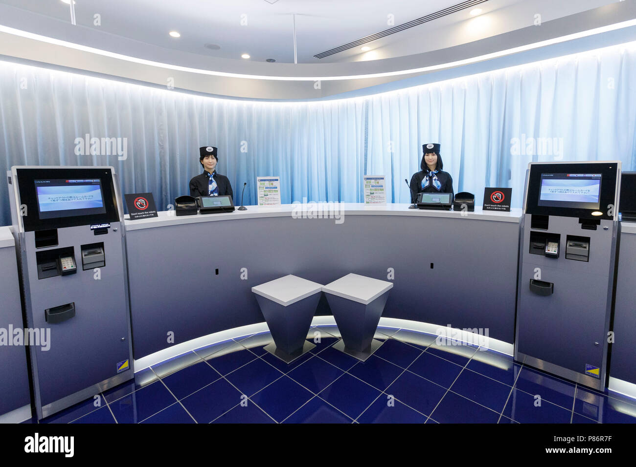 Tokyo, Japan. 10th July 2018. Humanoid robots work at the front desk of ...