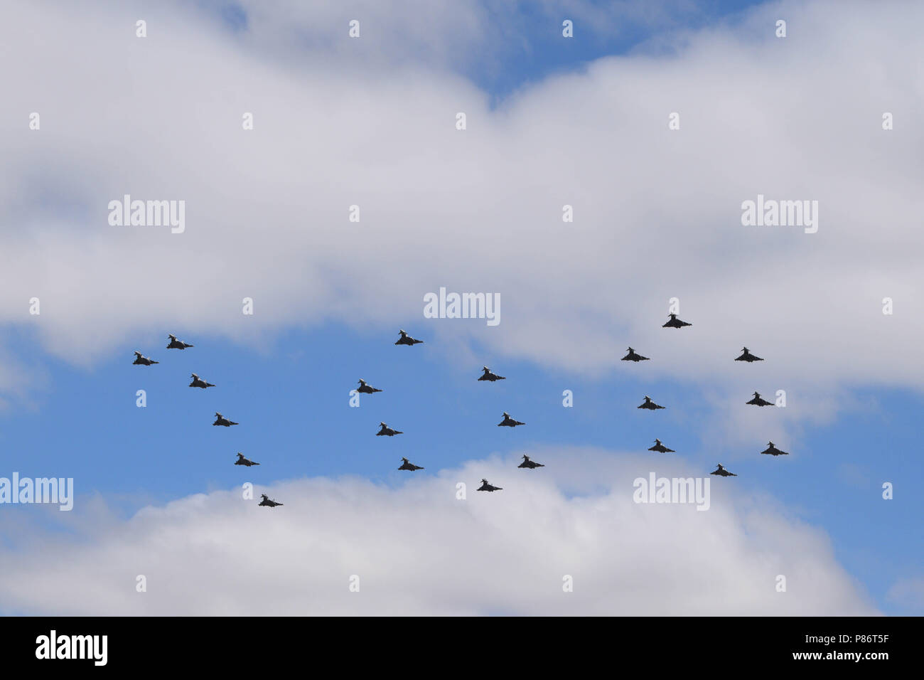 London, UK. 10th July, 2018. Planes fly overhead in the RAF 100 flypast ...