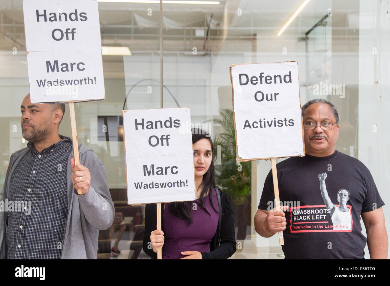 London UK 10th July 2018 Black activists including Marc Wadsworth hands ...