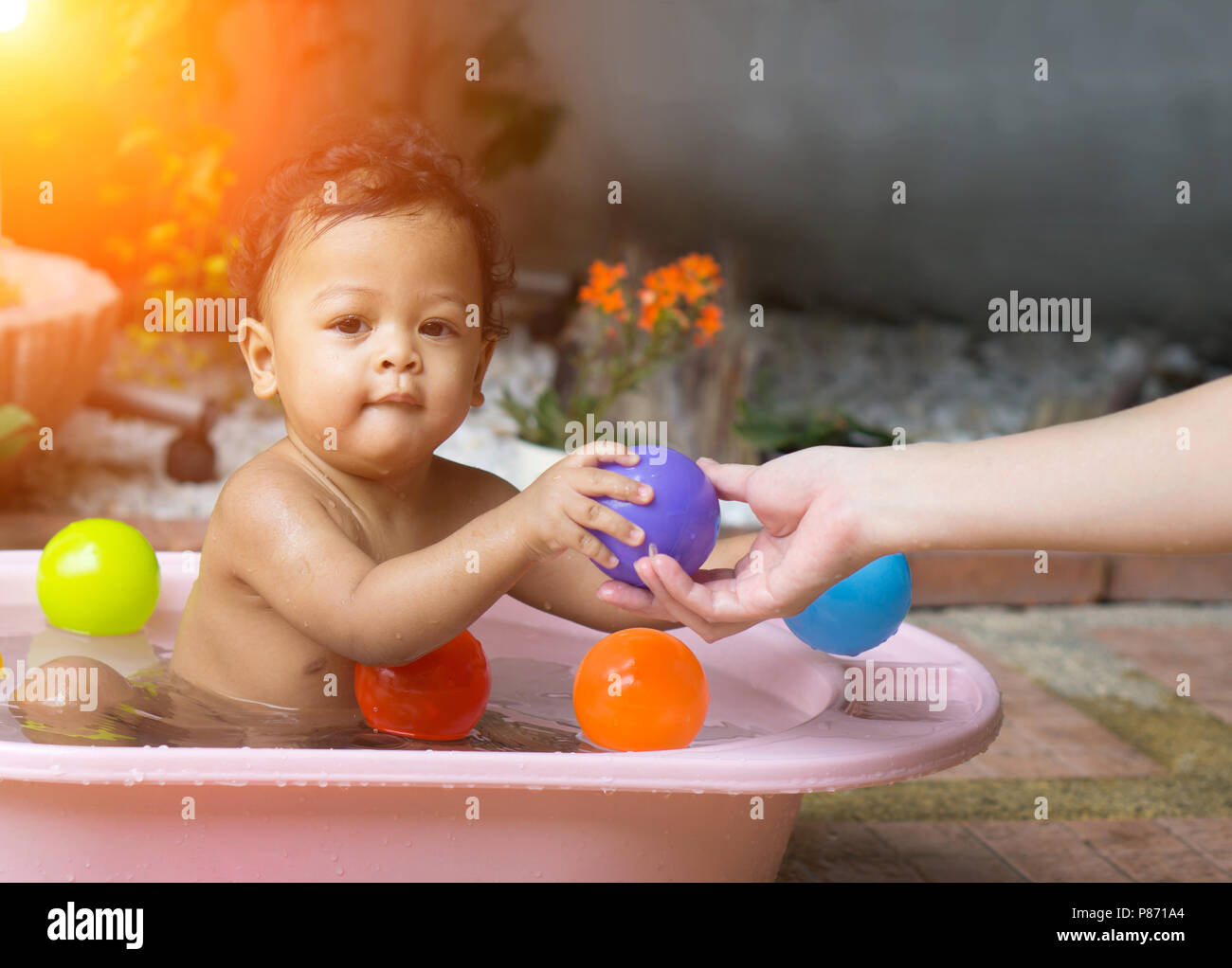 Asian kid bathing hi-res stock photography and images - Alamy