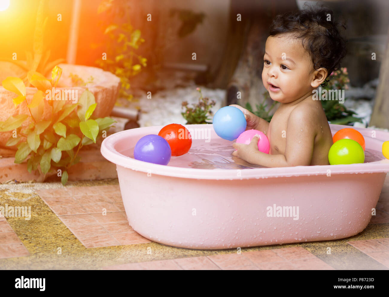 Asian kid bathing hi-res stock photography and images - Alamy