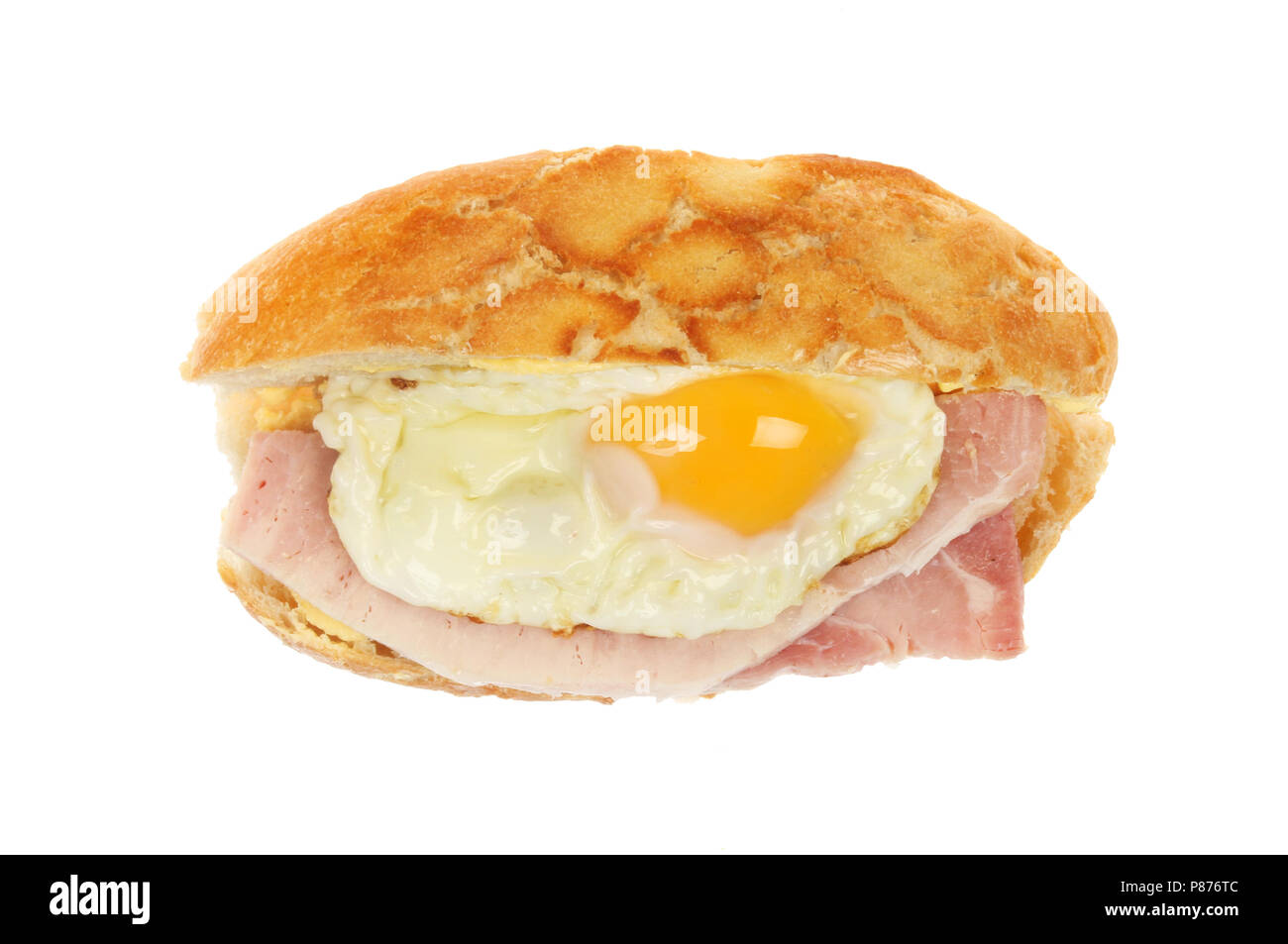 Fried egg and ham roll isolated against white Stock Photo - Alamy