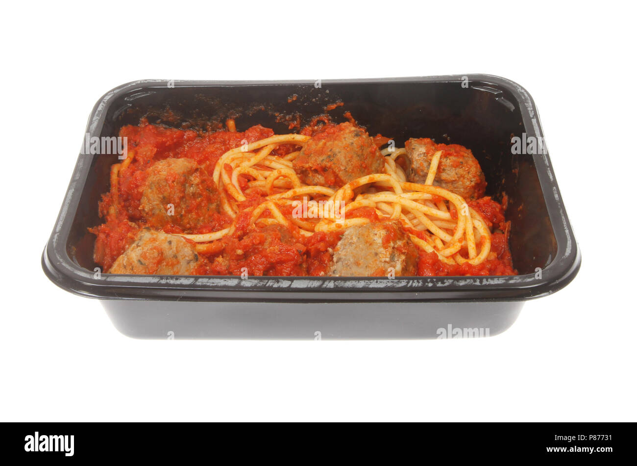 Spaghetti meatballs in a plastic carton isolated against white Stock ...