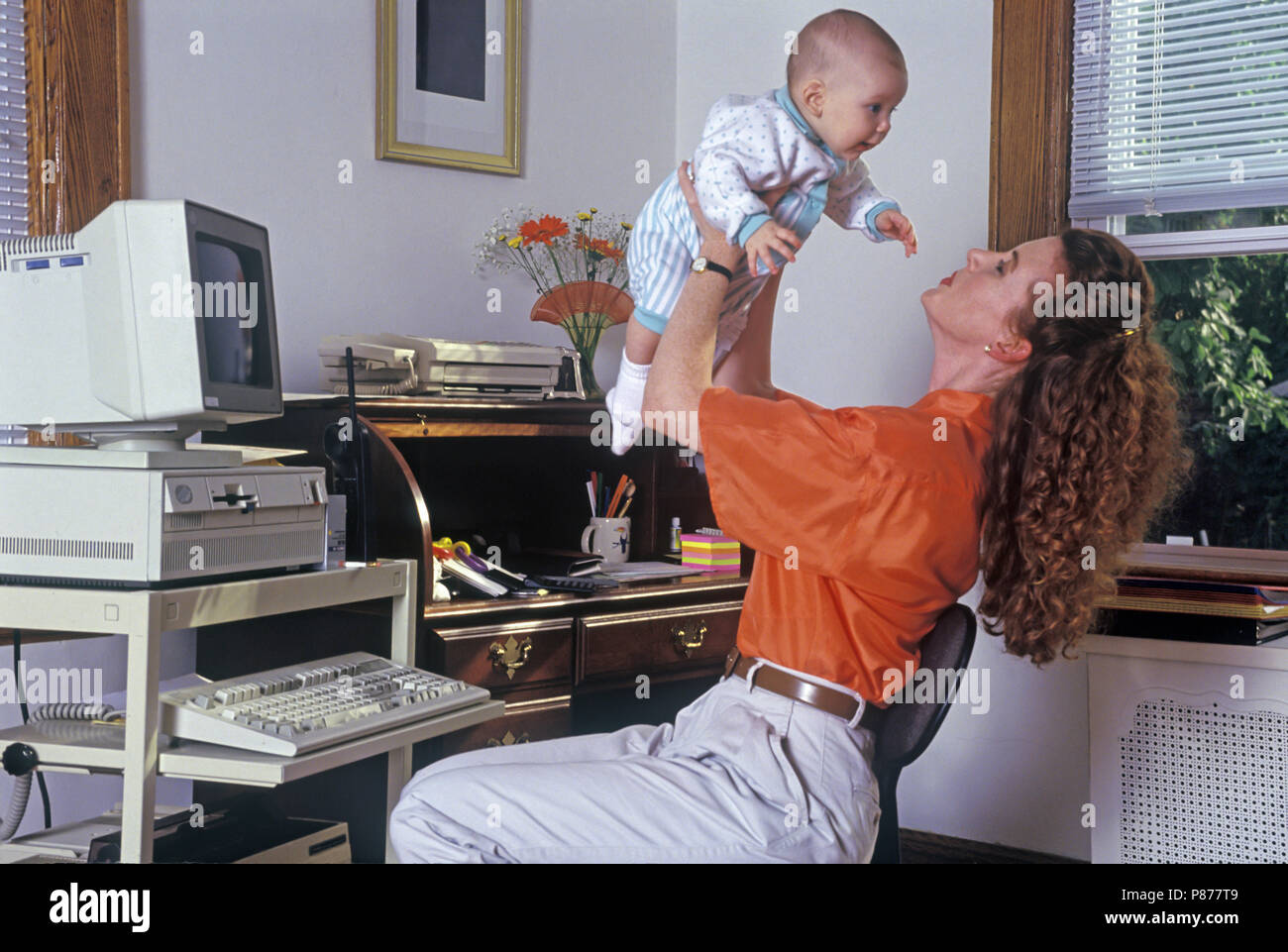 1994 HISTORICAL CAUCASIAN MOTHER HOLDING INFANT BABY SITTING BY ...