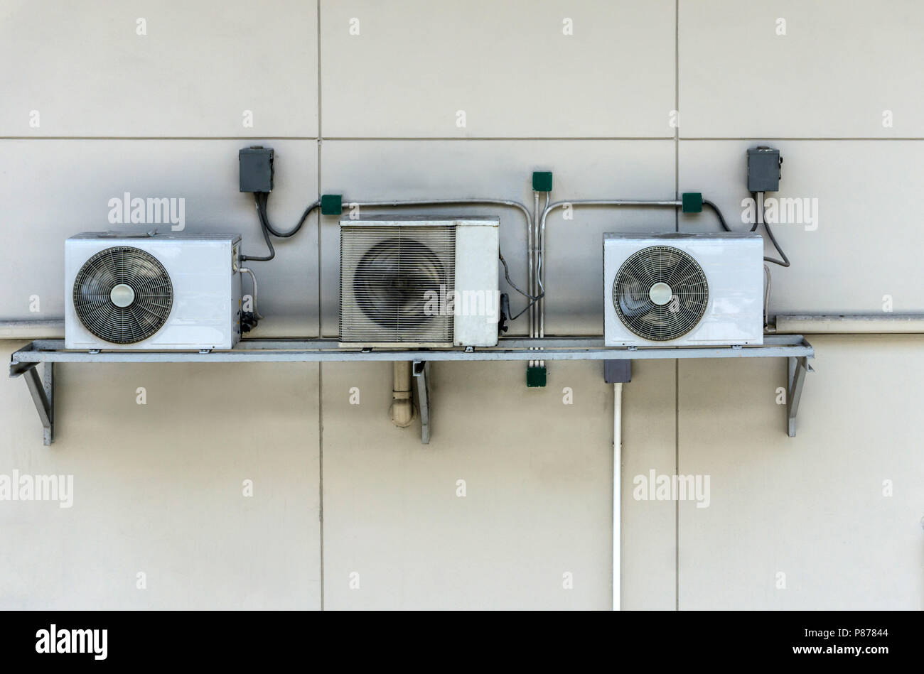 Air conditioning compressor in white wall - Air compressor or ...