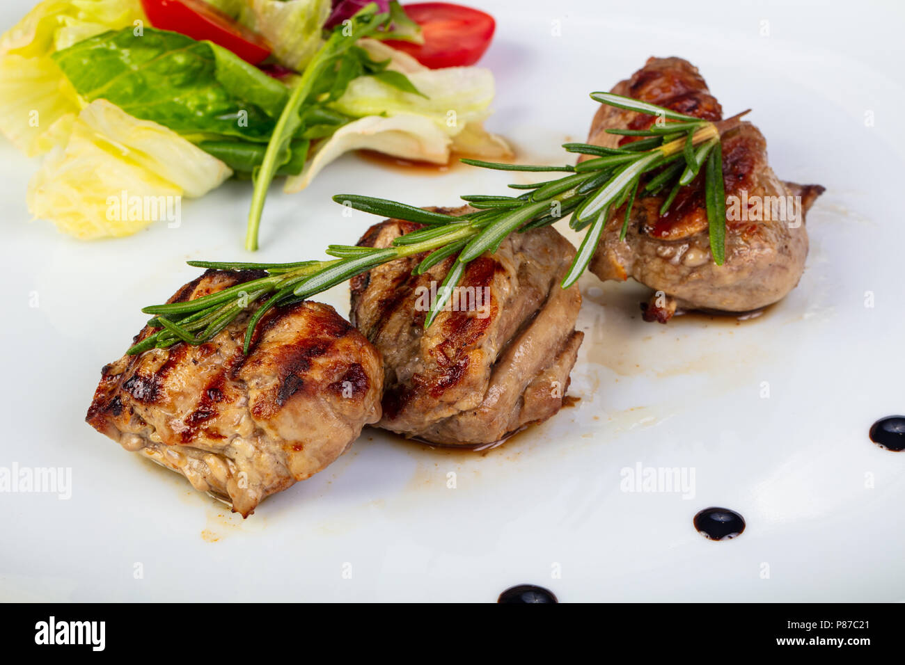 Delicious beef medallions with salad Stock Photo - Alamy