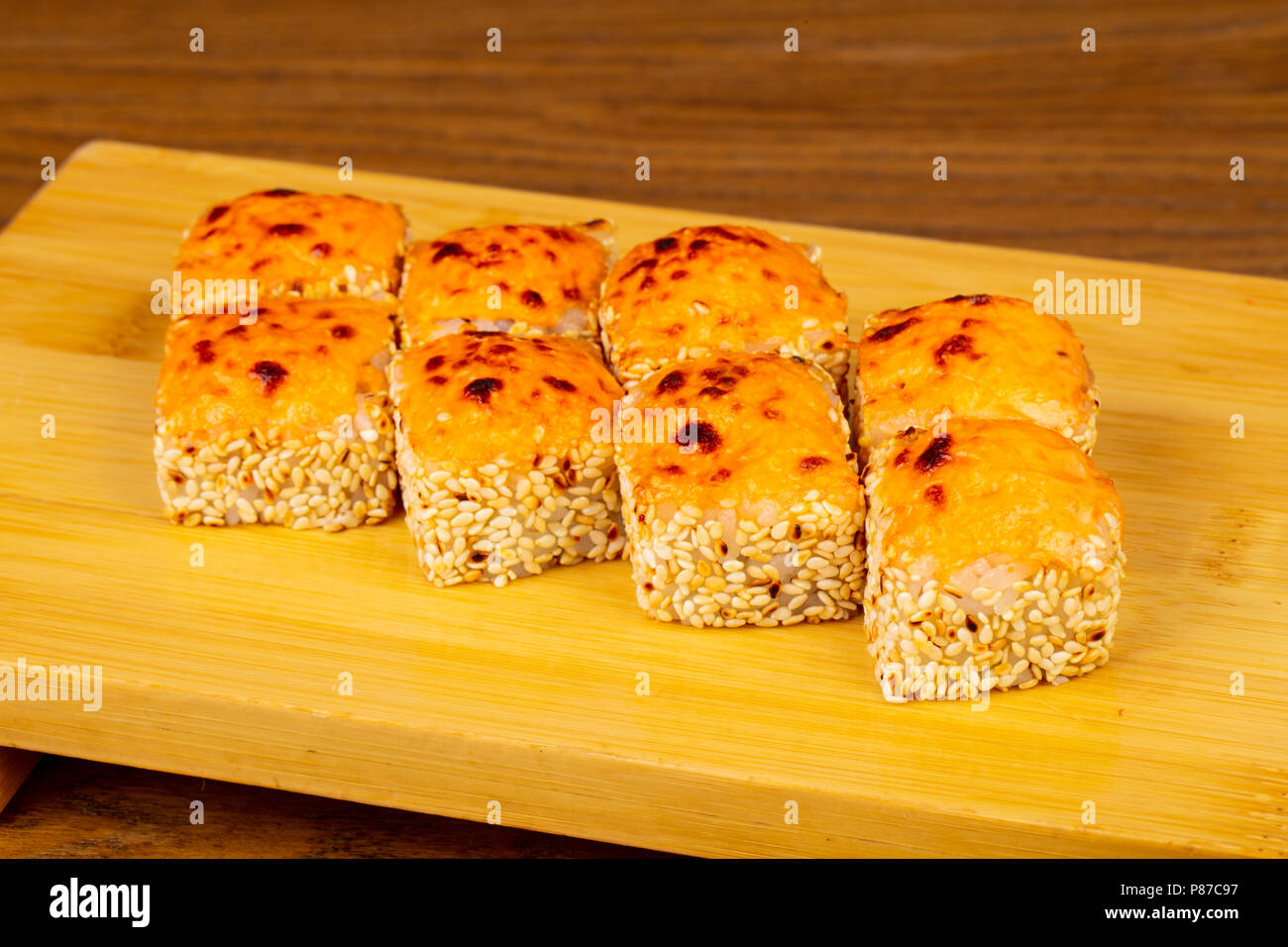 Delicious fried cheese sushi rolls with tuna Stock Photo - Alamy