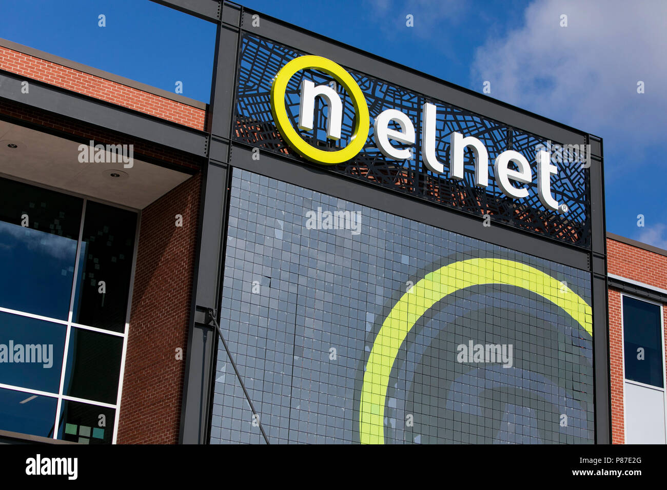 A logo sign outside of a facility occupied by Nelnet in Lincoln ...