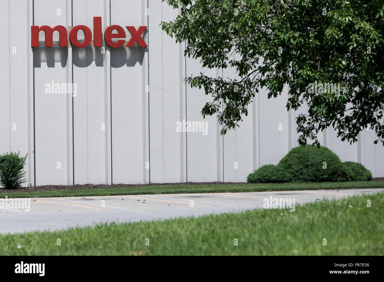 A logo sign outside of a facility occupied by Molex, Inc., in Lincoln ...